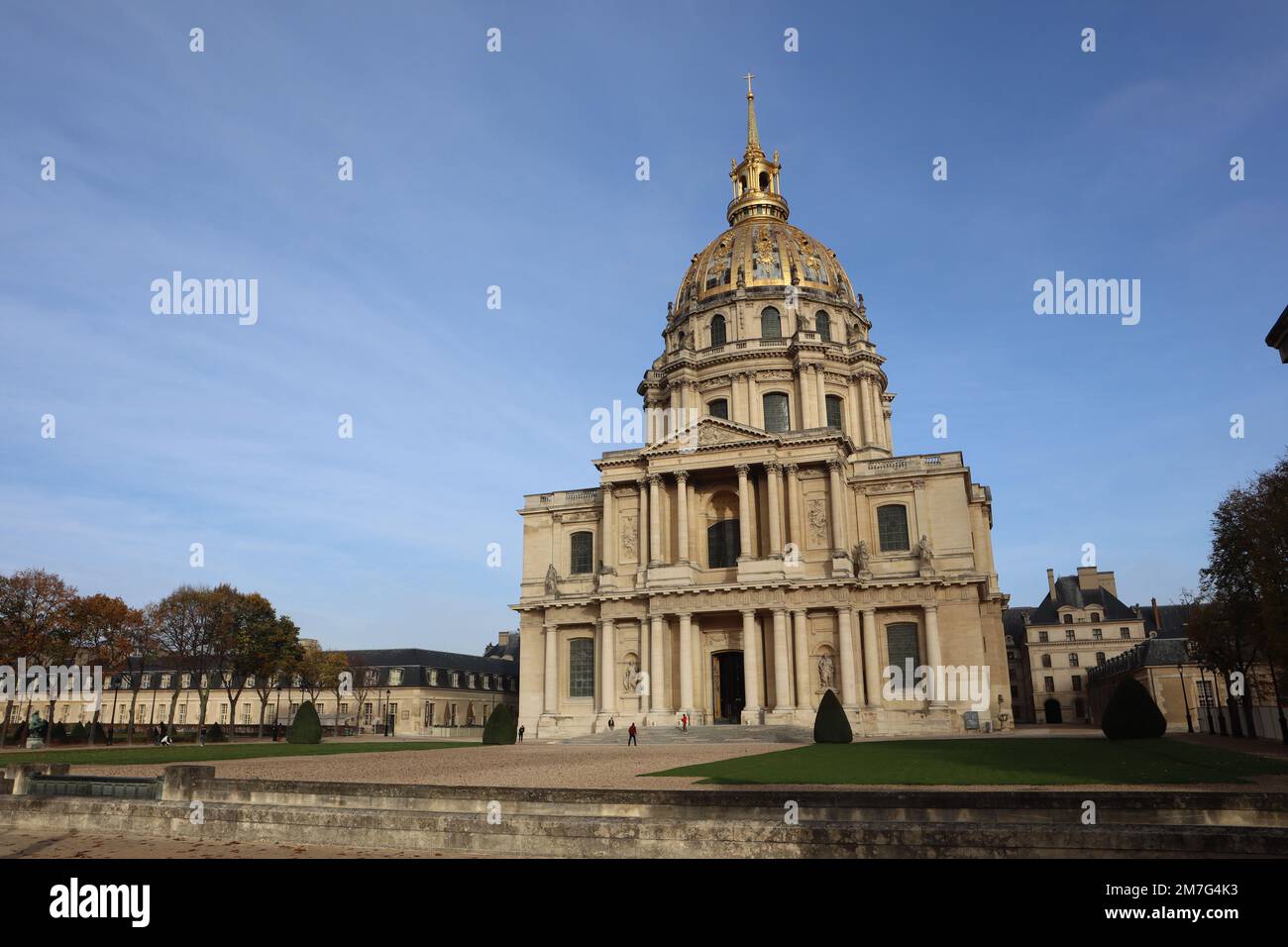The famous Les Invalides building in Paris against a blue cloudy sky ...