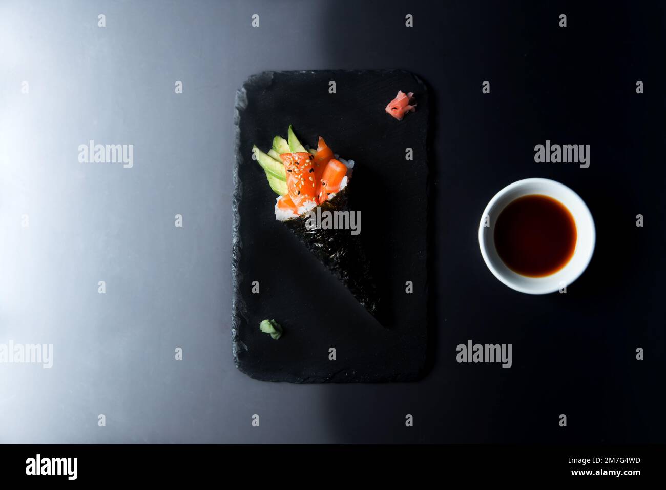 Salmon temaki. Temakis are cone-shaped pieces of sushi made of nori ...