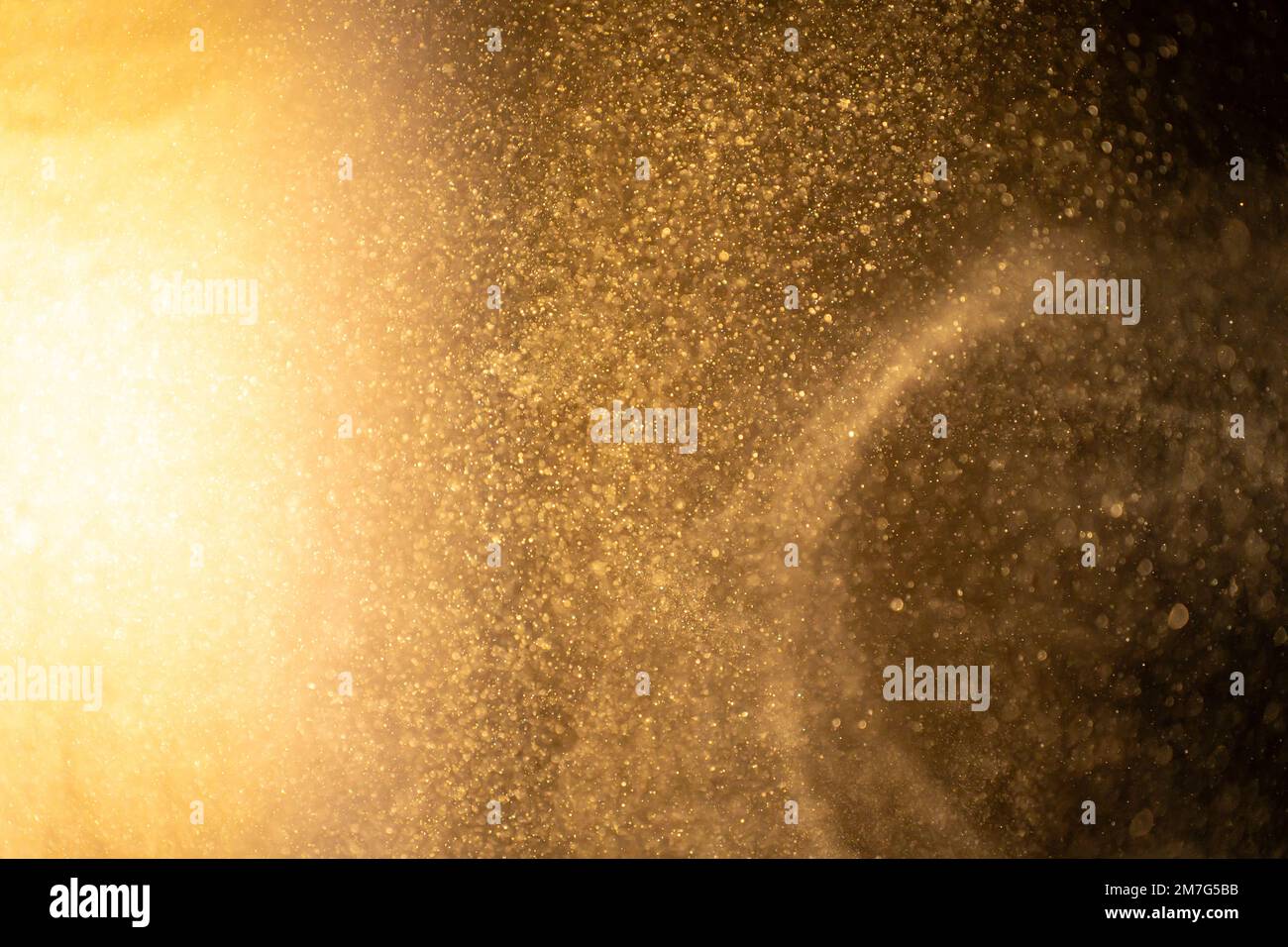 Gold dust particles abstract Bokeh star particle on Black Background. Futuristic dots in space ...