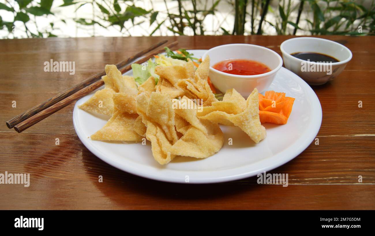 Fried wan tan dumpling. Won ton is a very thin and stuffed dough that ...