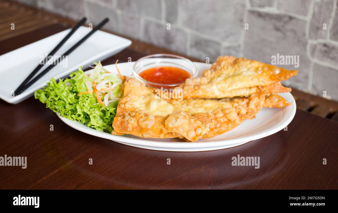 Fried wan tan dumpling. Won ton is a very thin and stuffed dough that ...