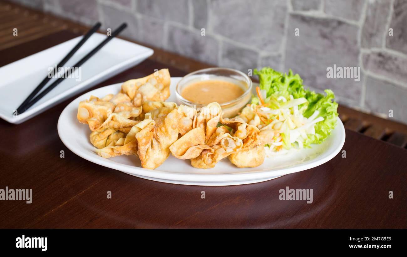 Fried wan tan dumpling. Won ton is a very thin and stuffed dough that ...