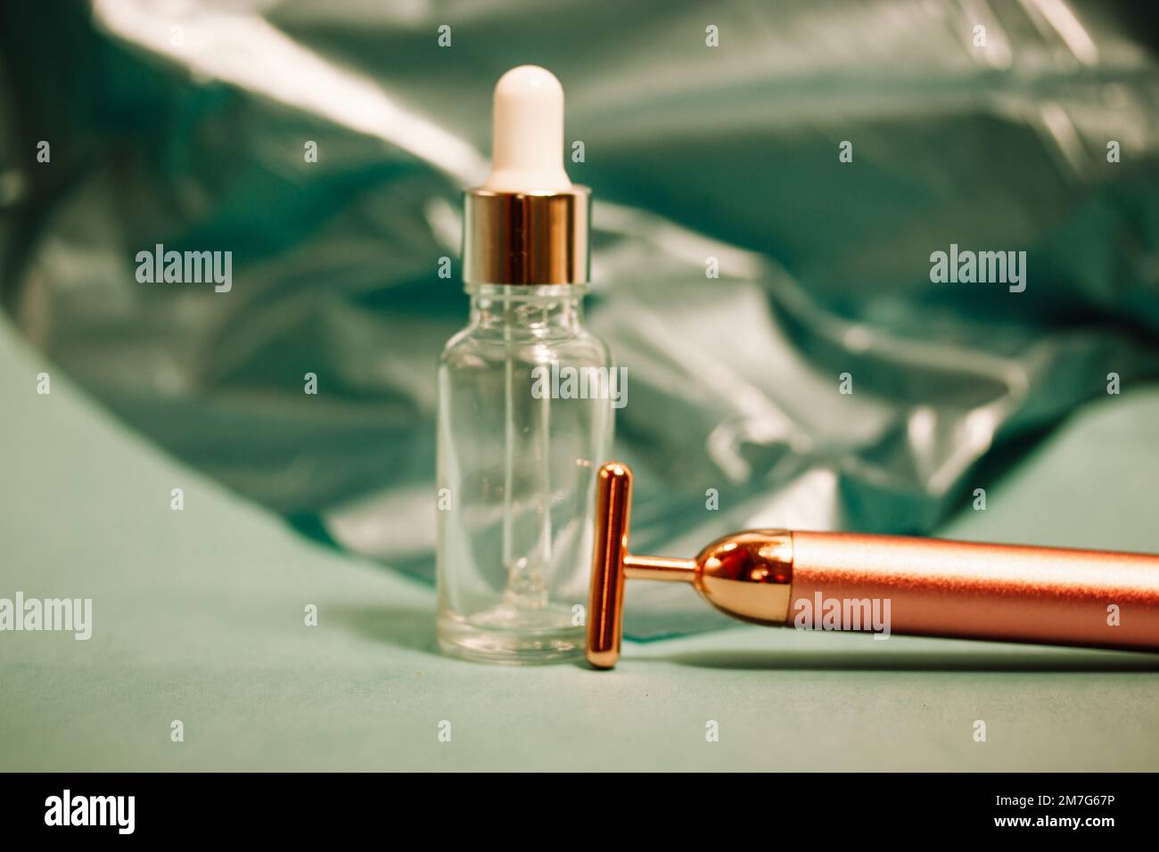 Vibrating golden facial massager, oil dropper for massage olive green ...