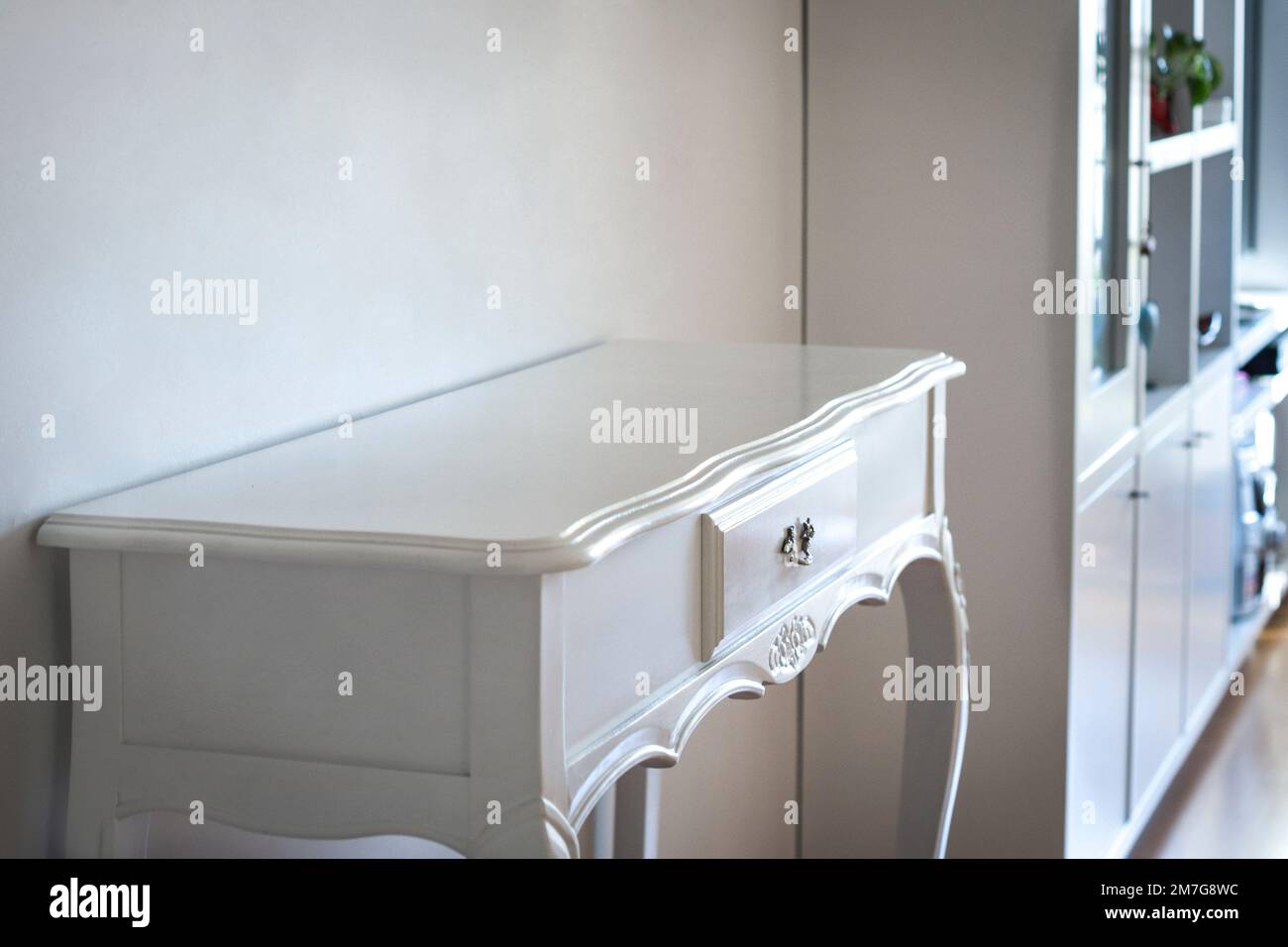 mpty white classic console over white wall Stock Photo - Alamy