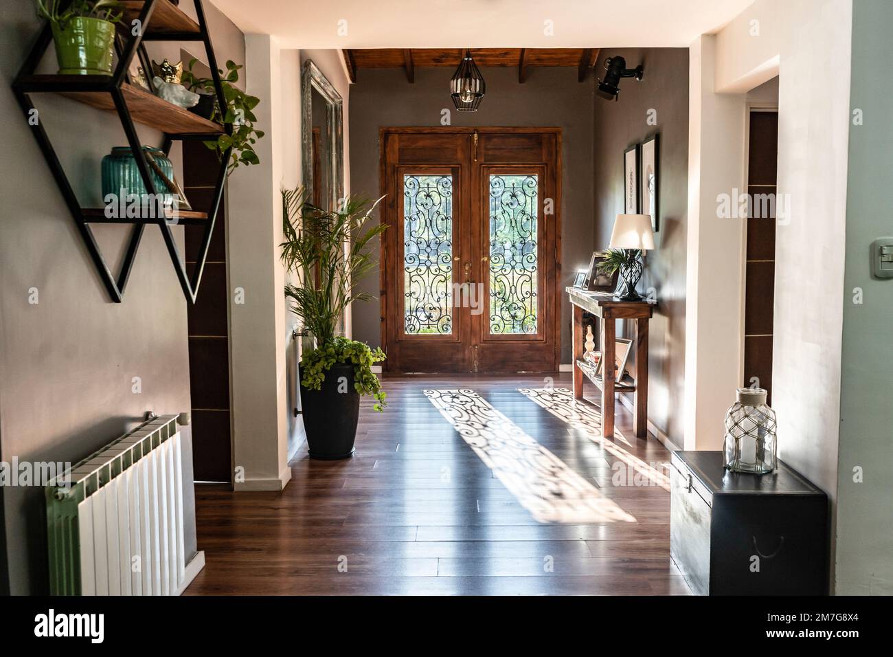View of a trendy wooden front door from the inside Stock Photo - Alamy