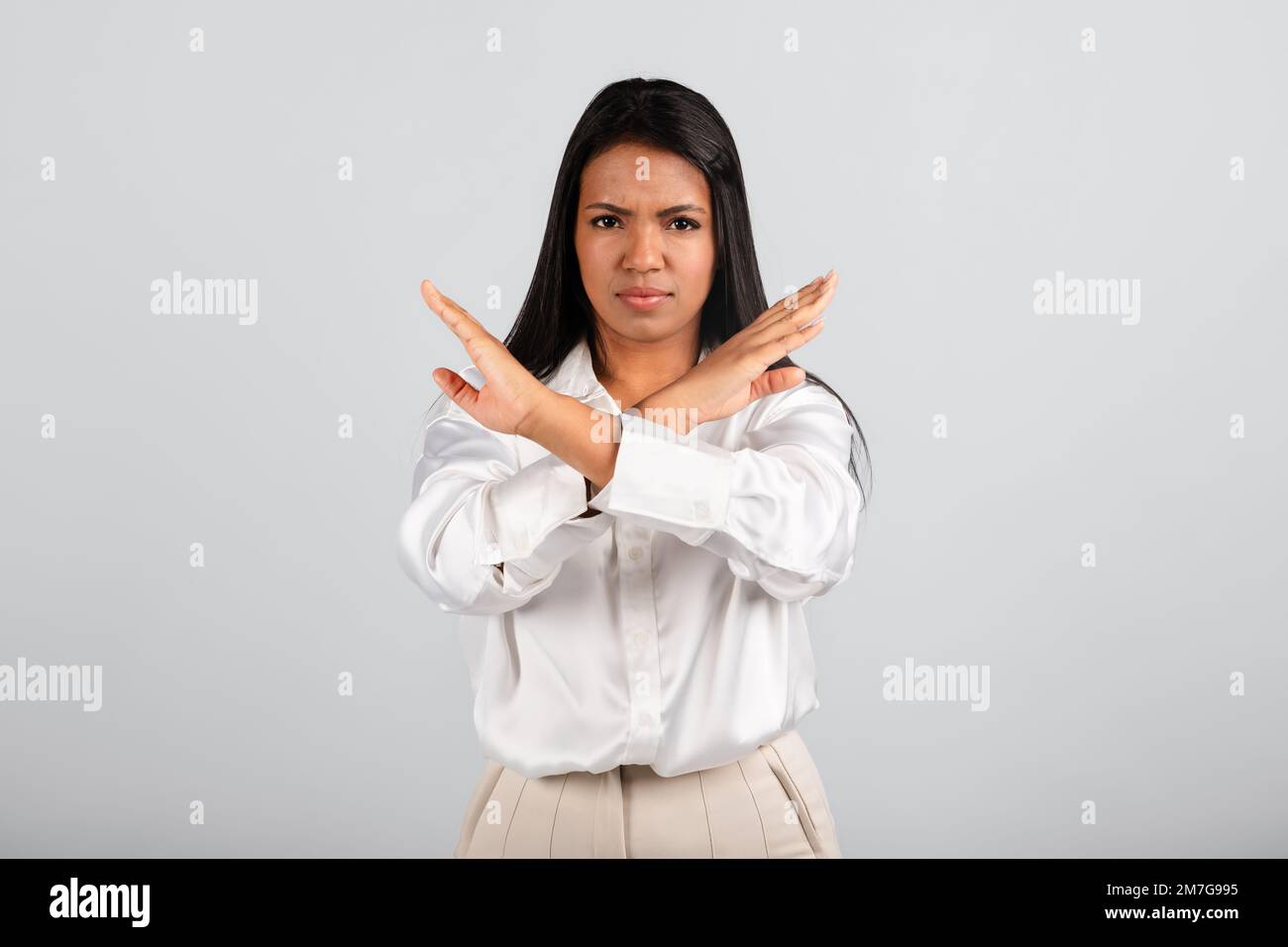 Angry serious confident millennial black lady do stop gesture, cross ...