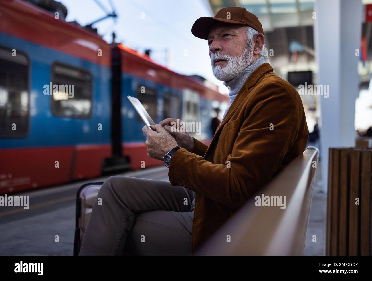 Old man waiting for his train hi-res stock photography and images - Alamy