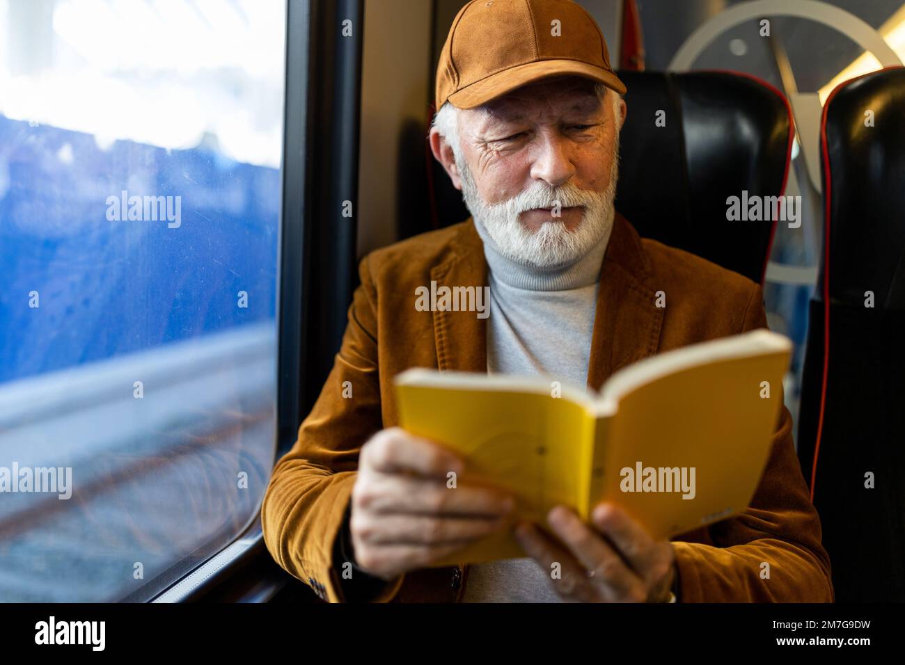 Man enjoying train travel senior transport hi-res stock photography and ...