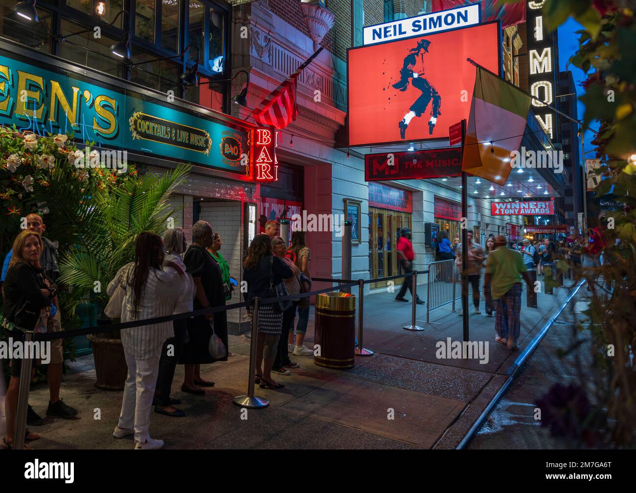 View of people in line to watch famous MJ musical in Neil Simon theater ...