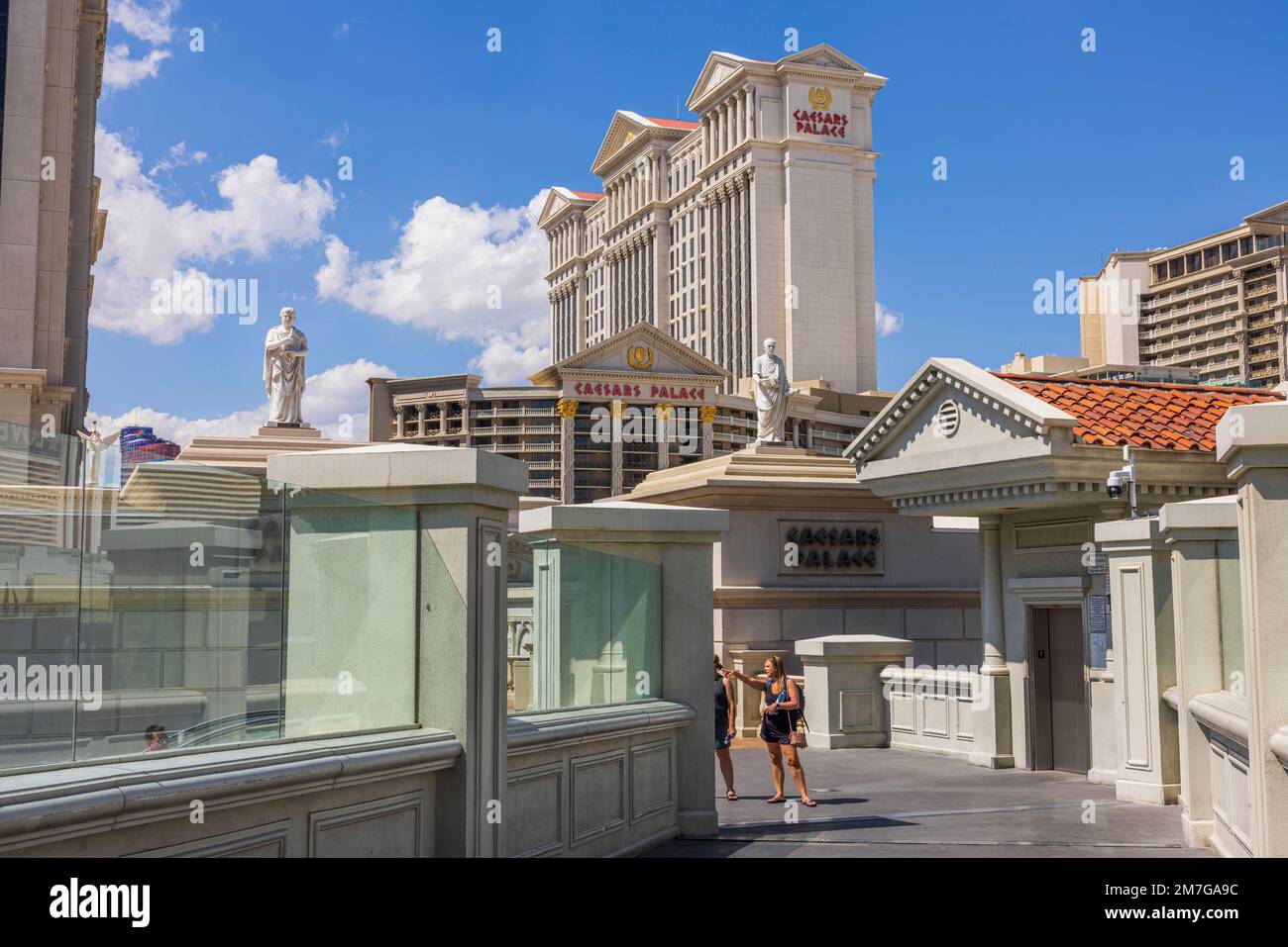 View of pedestrian bridge over Strip road and Caesars Palace hotel on ...