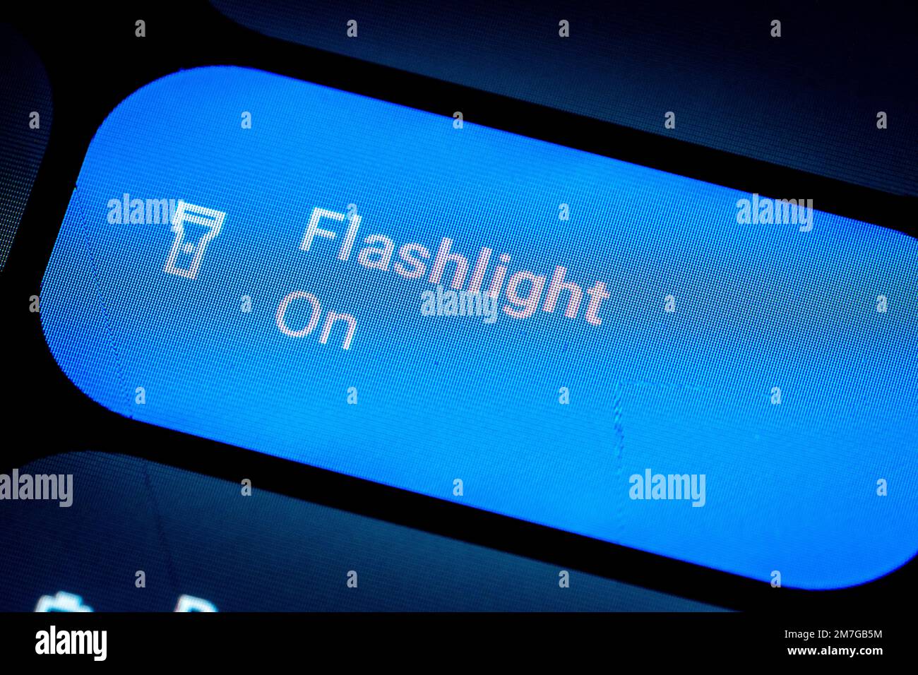 Active button to enable the flashlight of a smartphone Stock Photo - Alamy
