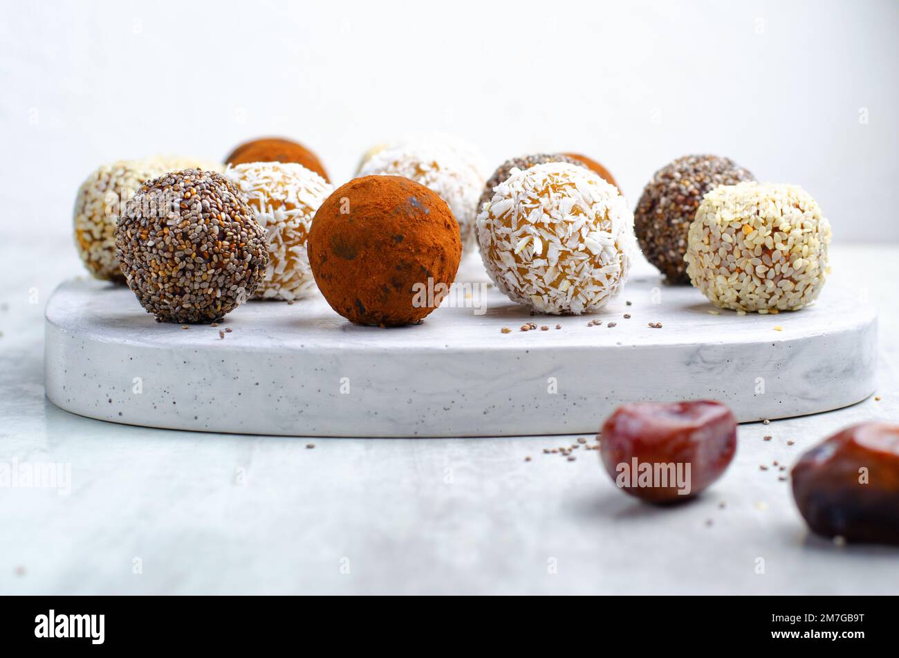 Assorted vegan sweets, Delicious Candy Balls with seeds, dried fruit ...