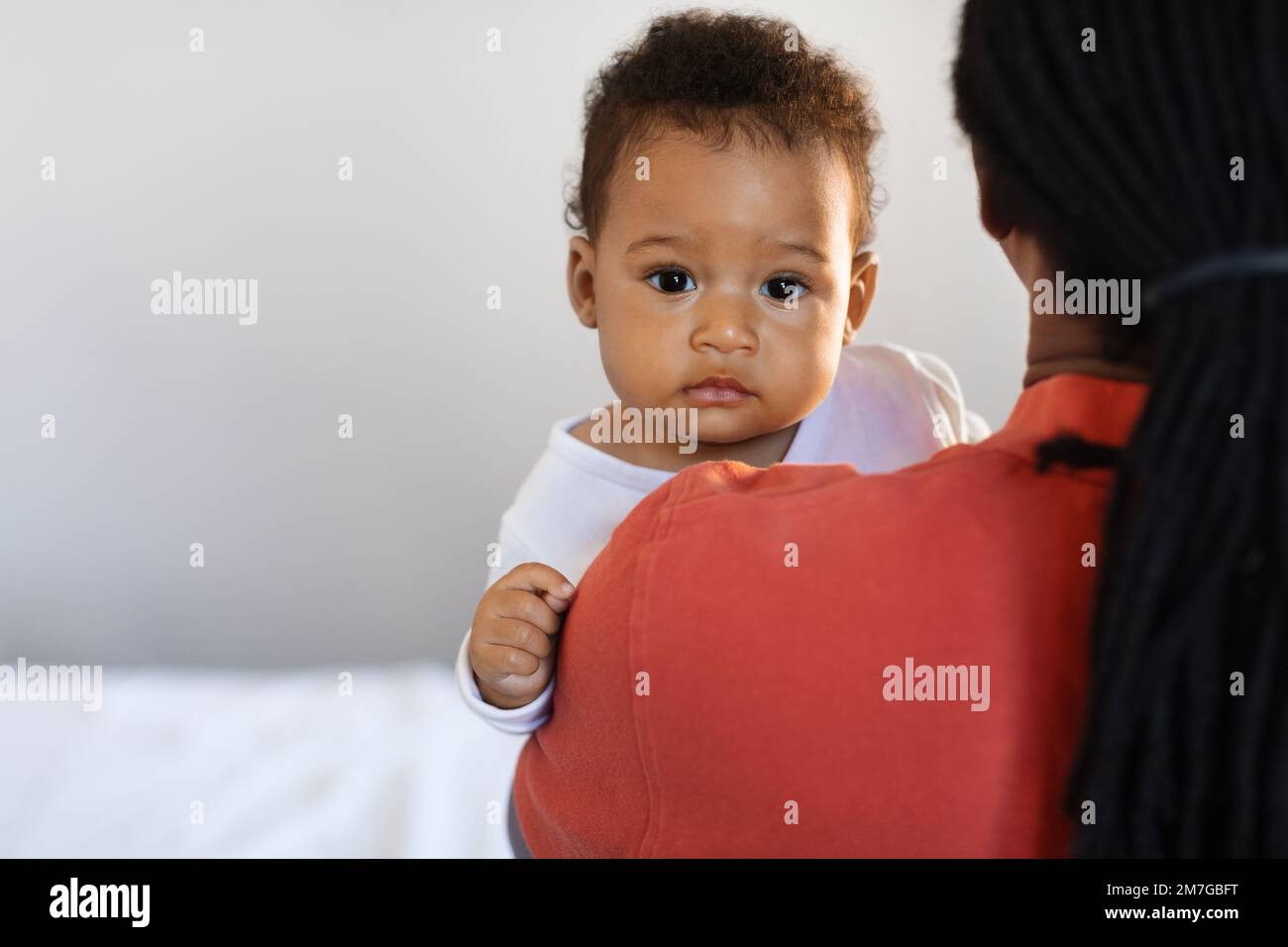African father cuddling infant hi-res stock photography and images - Alamy