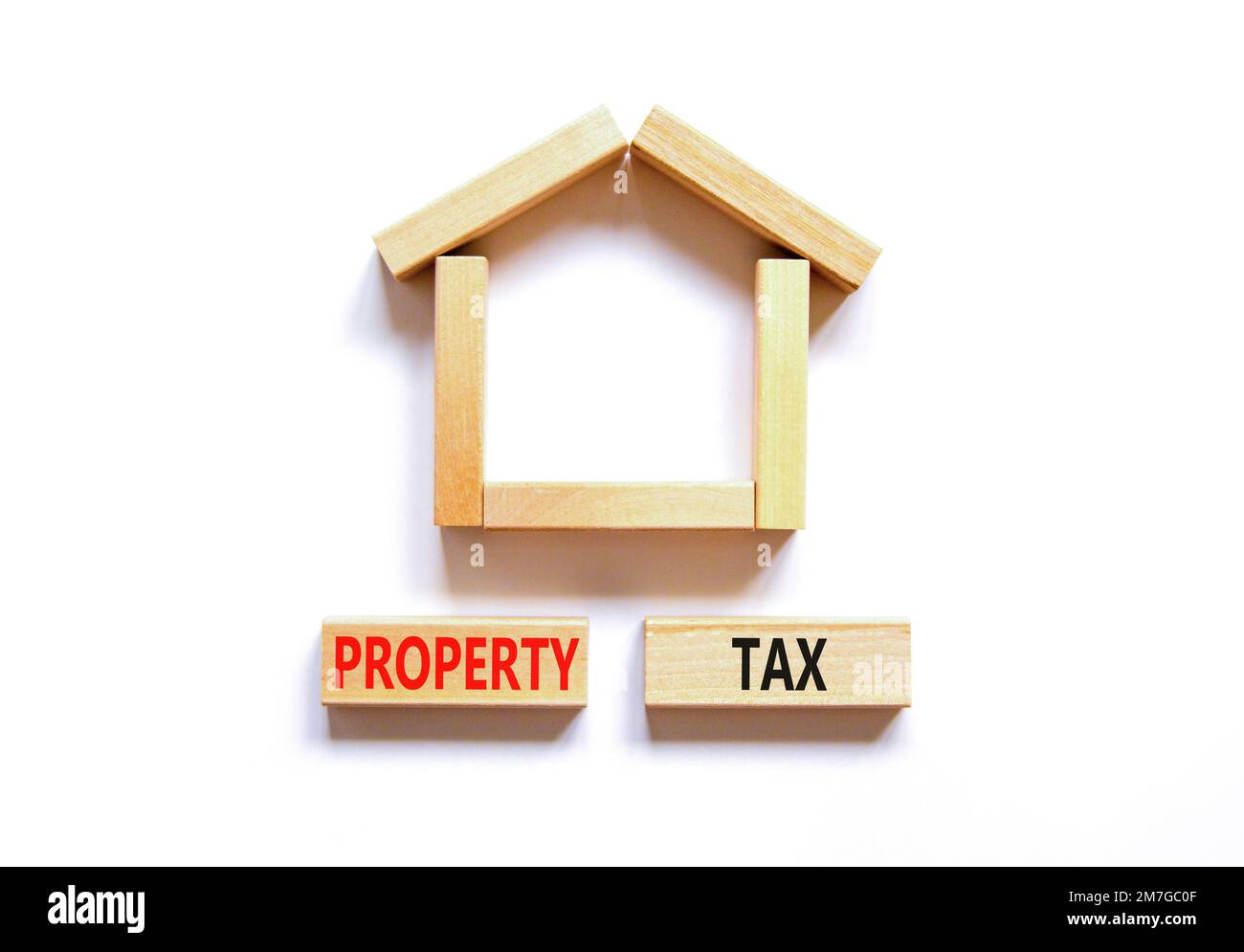 Property tax symbol. Concept words Property tax on wooden blocks ...