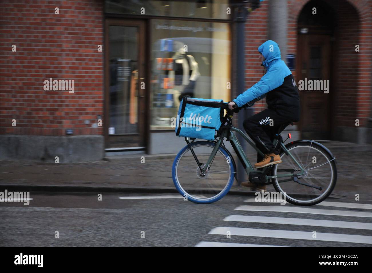 Copenhagen/Denmark/09 January 2023/Wolt partner delivert biker in ...