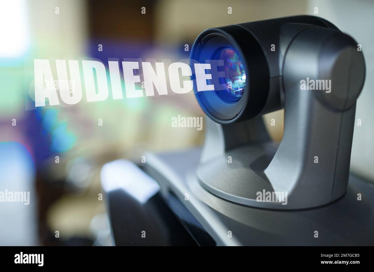 Business and learning concept. A blue beam glows from the projector ...