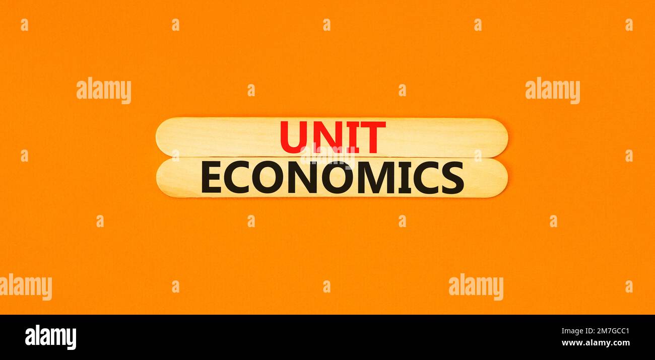 Unit economics symbol. Concept words Unit economics on wooden stick ...