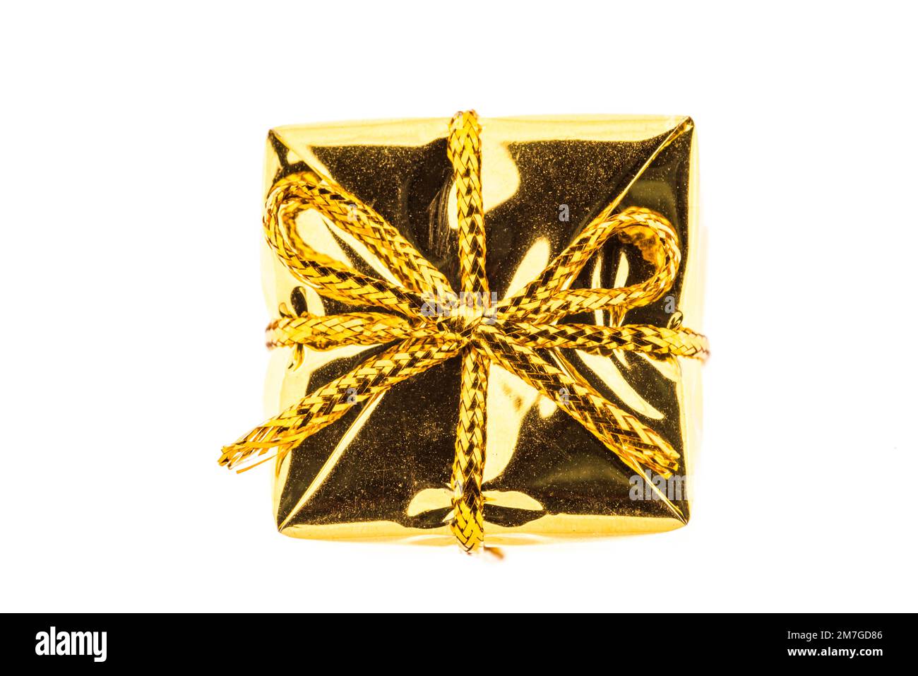 Gift box of gold color isolated on white background Stock Photo - Alamy