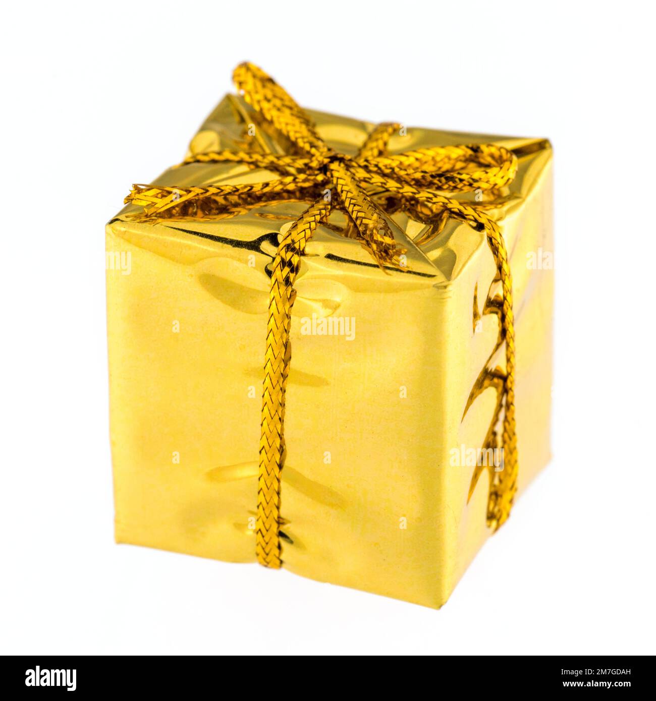 Gift box of gold color isolated on white background Stock Photo - Alamy