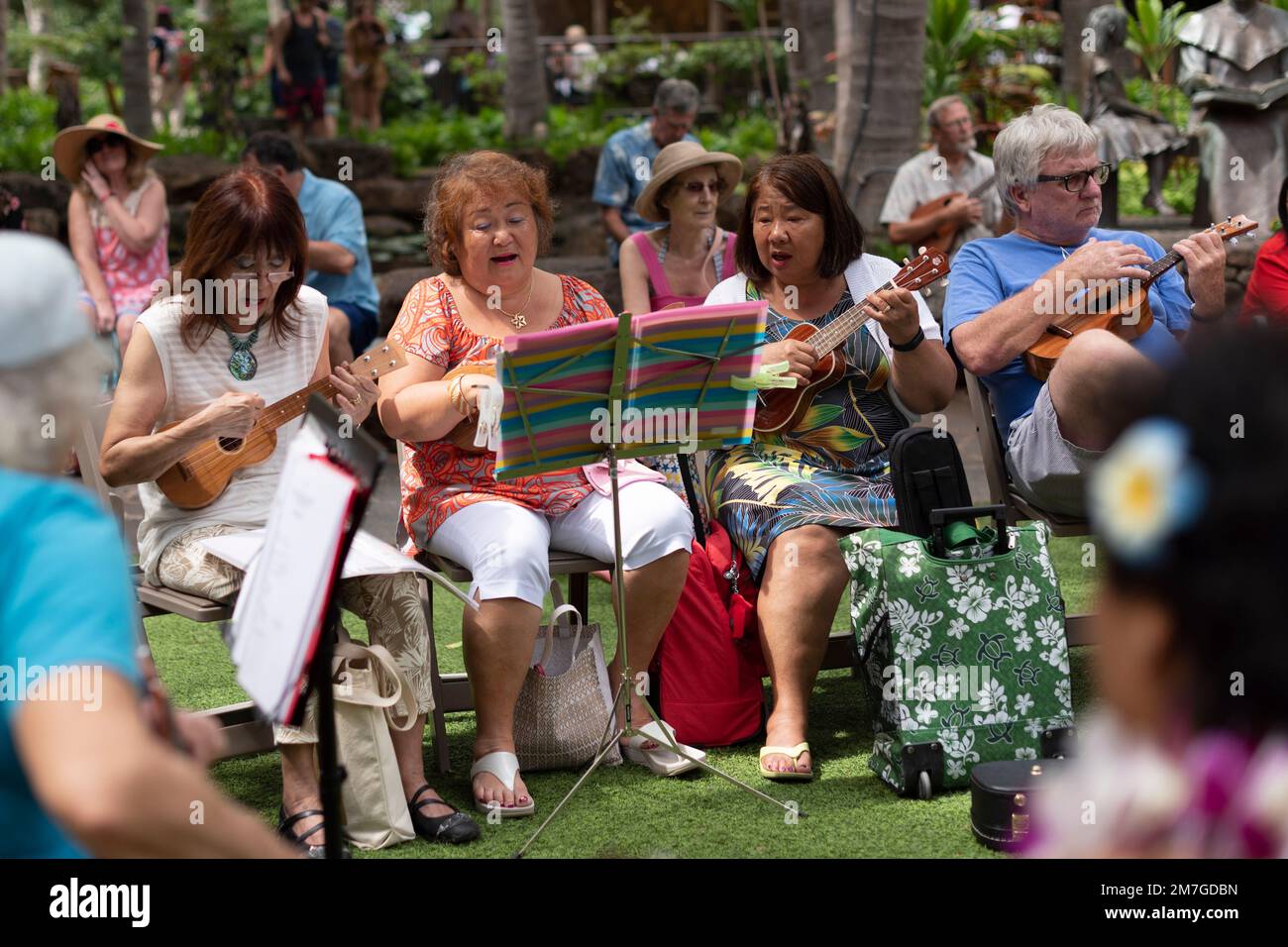 Waikiki, Oahu, Hawaii, USA – February 2018: Local people singing and ...