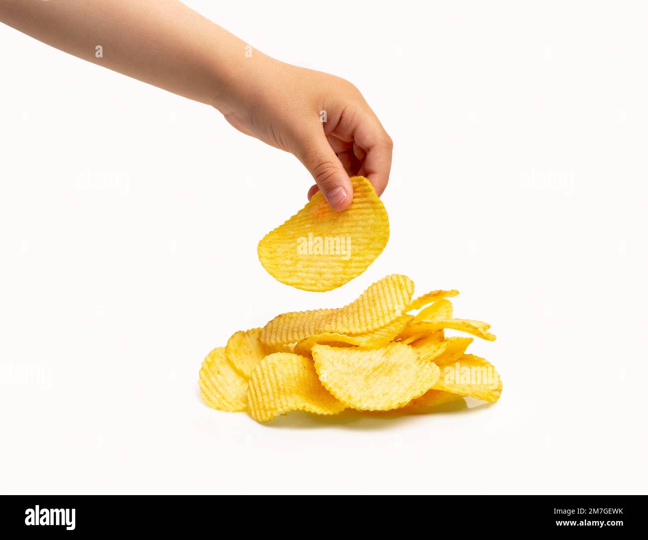 Hand holding potato chips isolated on a white background Stock Photo ...