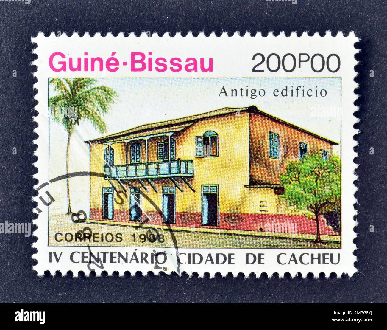 Cancelled postage stamp printed by Guinea Bissau, that shows Old House ...