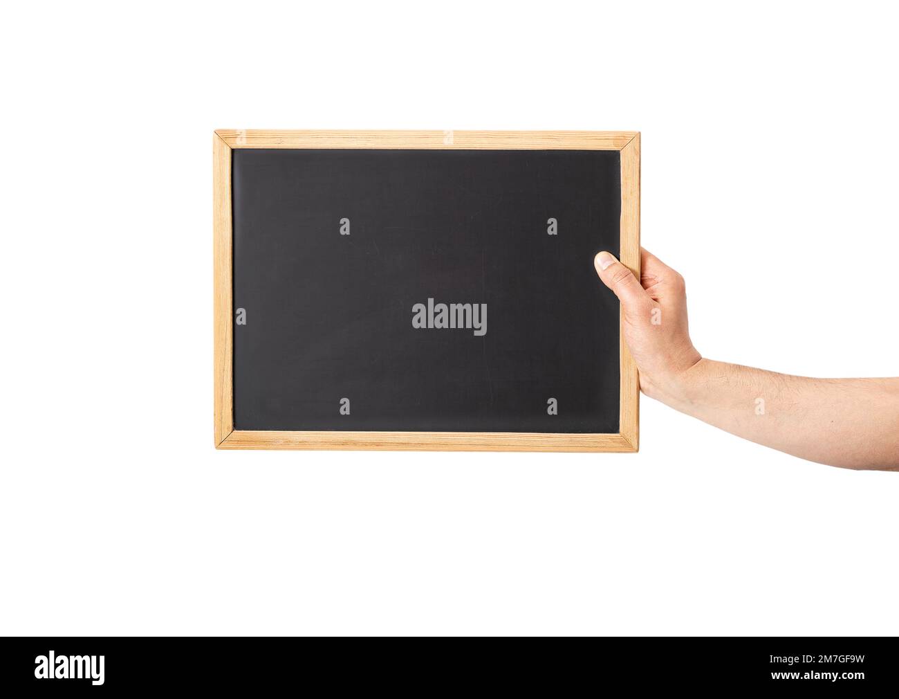 Man holding a small blackboard with white background and copy space ...
