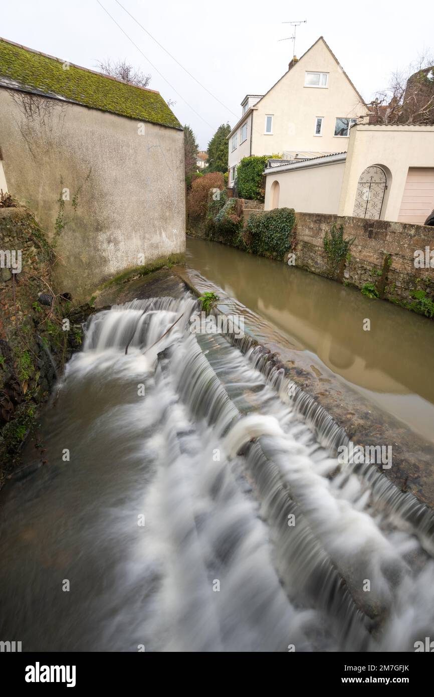 Long exposure of a watefall on the River Lim walkway at Lyme Regis in ...