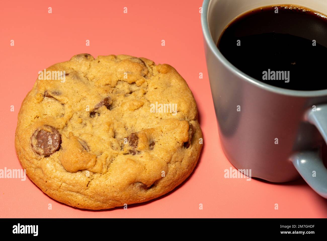 Gormet Cookie on a pink Background Stock Photo - Alamy