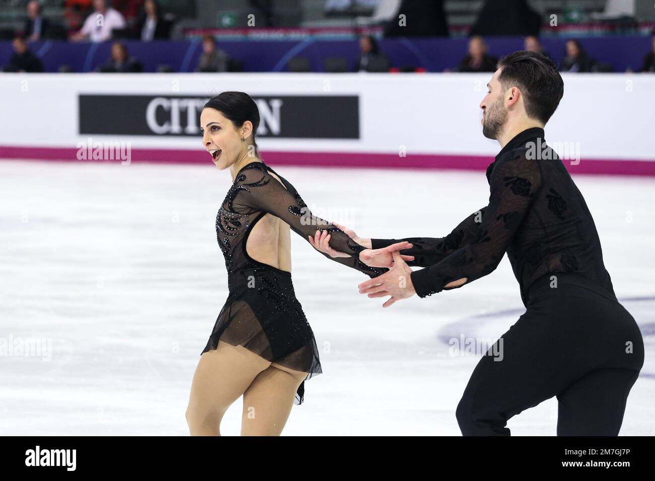 Deanna Stellato-Dudek and Maxime Deschamps (CAN) perform during the ...
