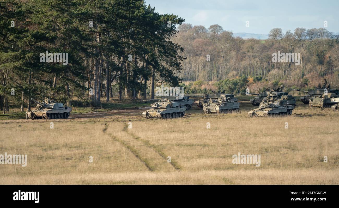 a squadron of battle tanks on a military combat exercise, Wiltshire UK ...