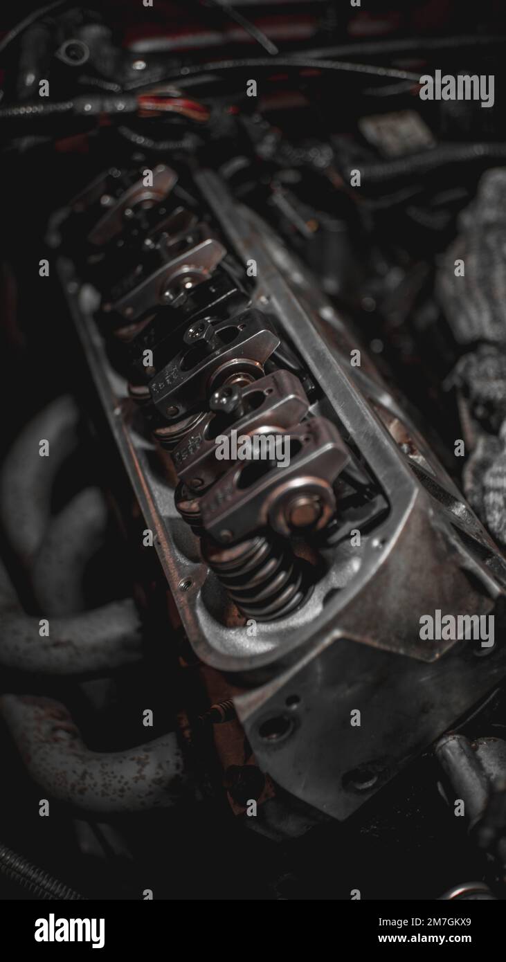 A vertical closeup shot of an exposed engine block of a car Stock Photo ...