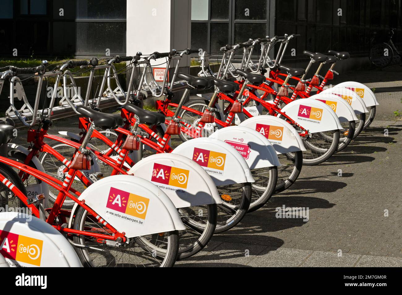 Antwerp, Belgium - August 2022: Row of bicycles parking in the parking station of the city's ...