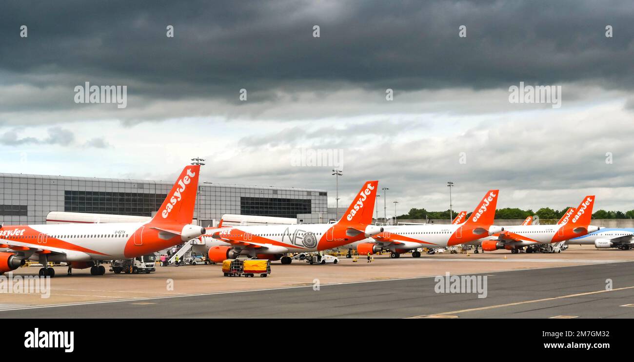 London, England - May 2022: Row of Easyjet Airbus planes at the airline ...