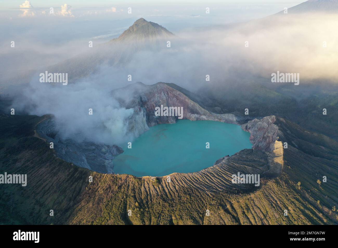 An aerial view of a lake located in the crater of the Ijen volcano ...