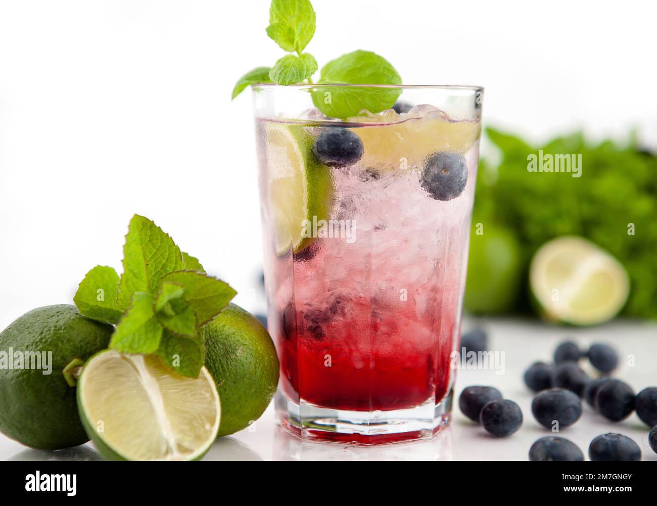 summer refreshing drinks on a white background with fresh fruit ...