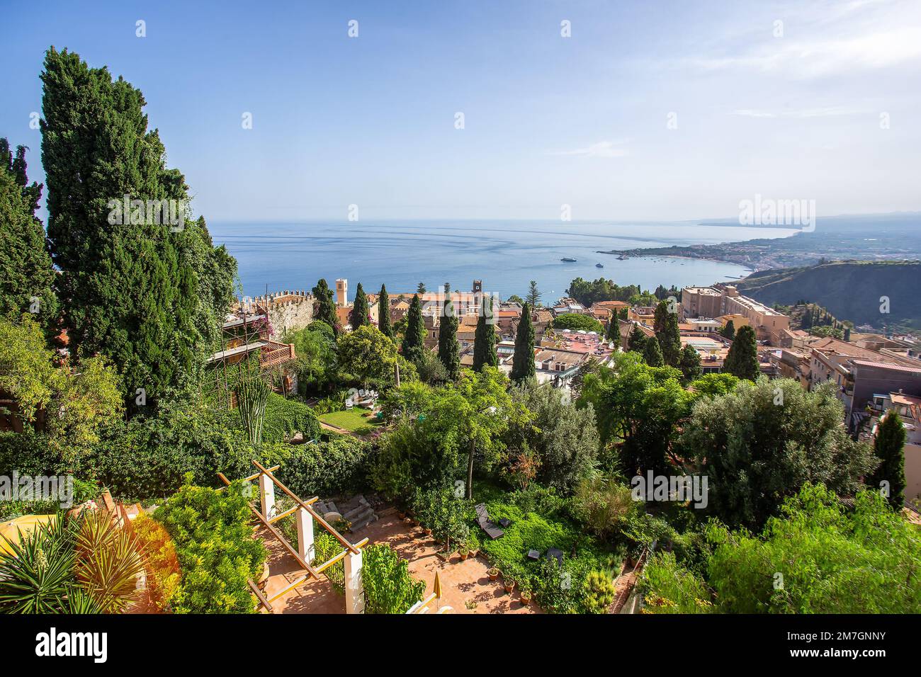 Awe-inspiring views of Taormina with the rooftops of the villas and the ...