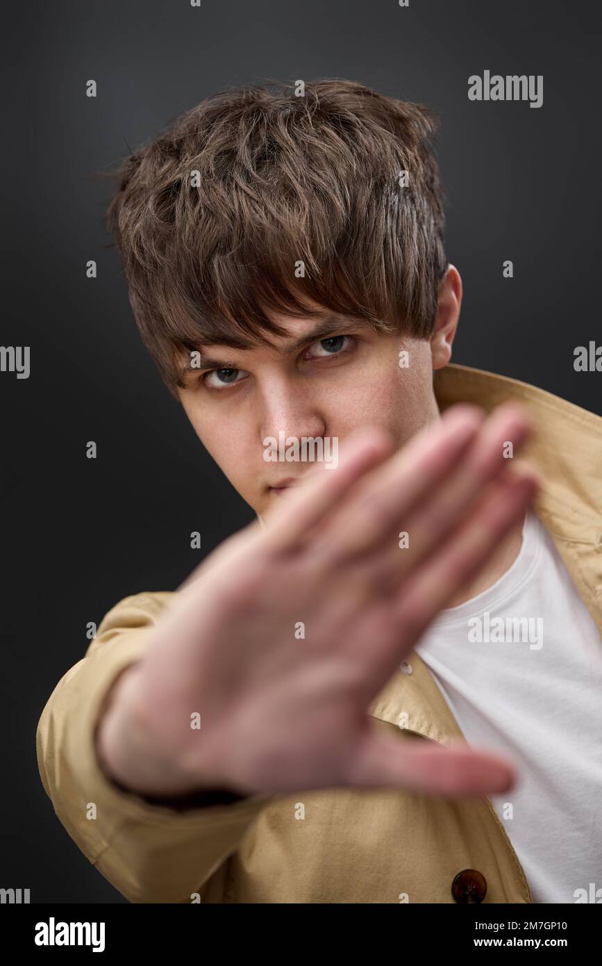 man doing stop sing with palm of the hand Stock Photo - Alamy
