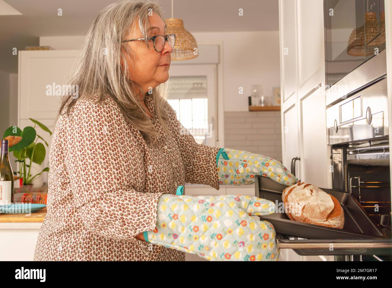 Bread baking woman at home hi-res stock photography and images - Alamy