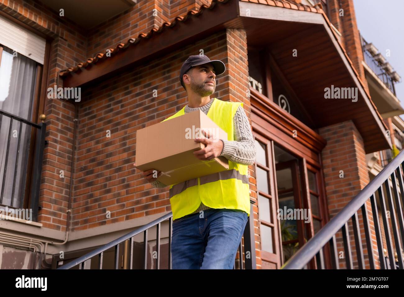 Package delivery man for an online store, delivery logistics company ...