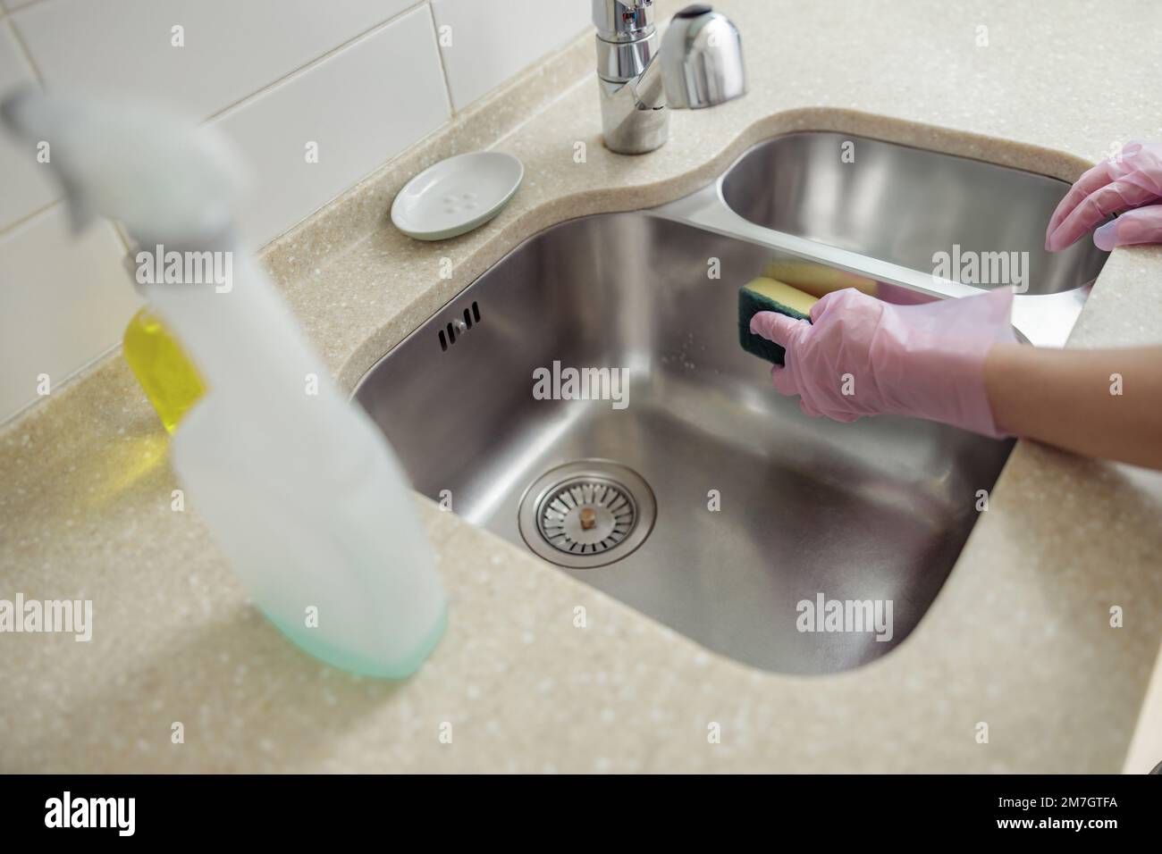 Closeup hands in yellow cleaning hi-res stock photography and images ...