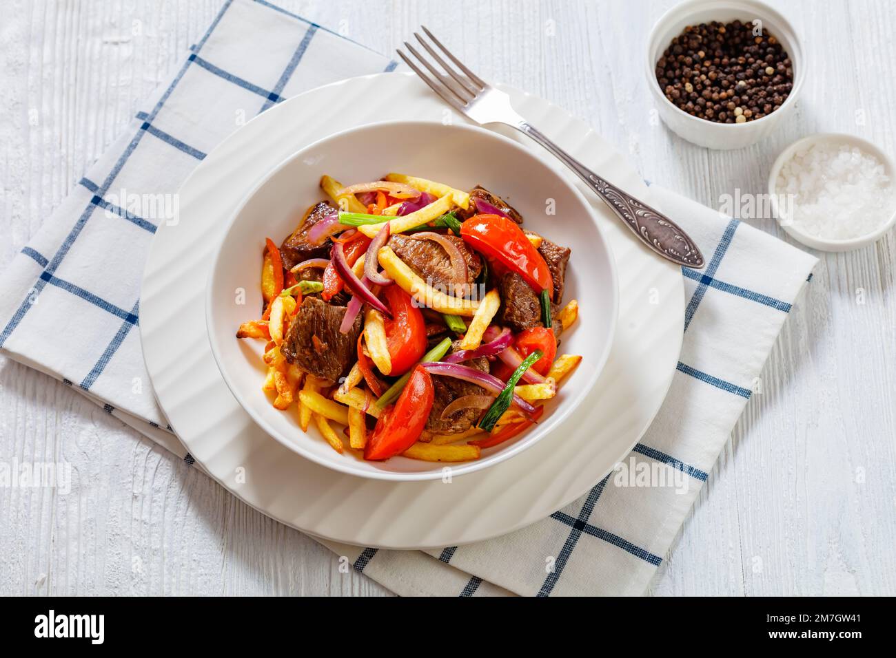 Lomo saltado, Peruvian dish of stir-fried slices of beef sirloin ...