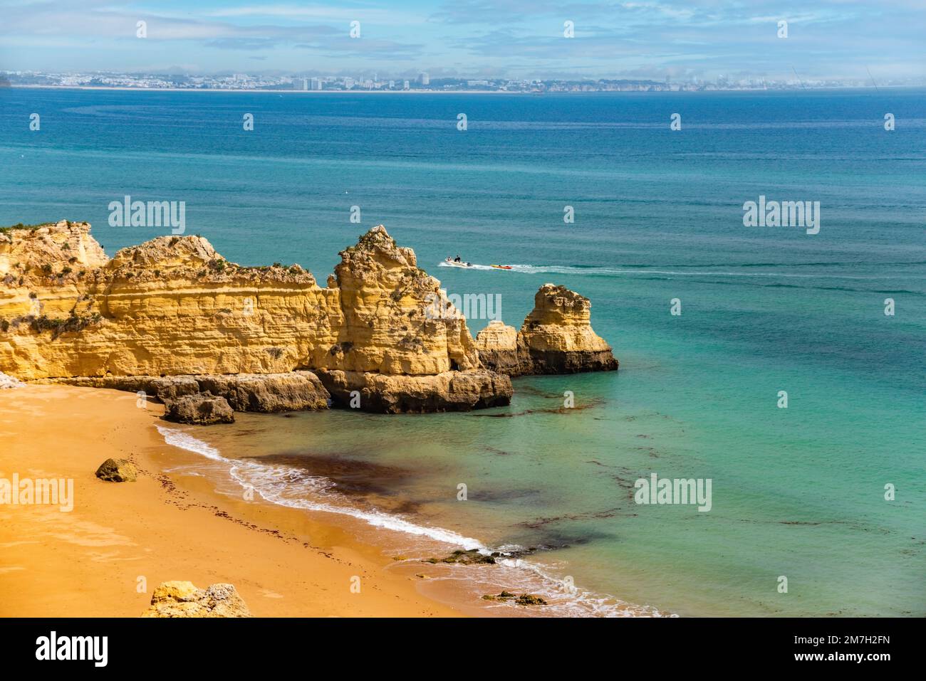 Natural caves and beach, Algarve Portugal. Rock cliff arches of Seven ...