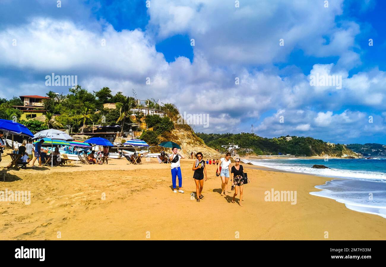 Beautiful paradise beach with mountains cliffs rocks high waves and ...