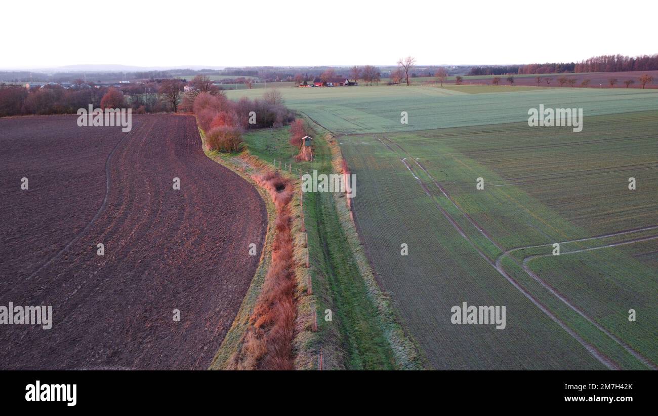 A scenic bird's eye view of an agricultural field during daytime in ...