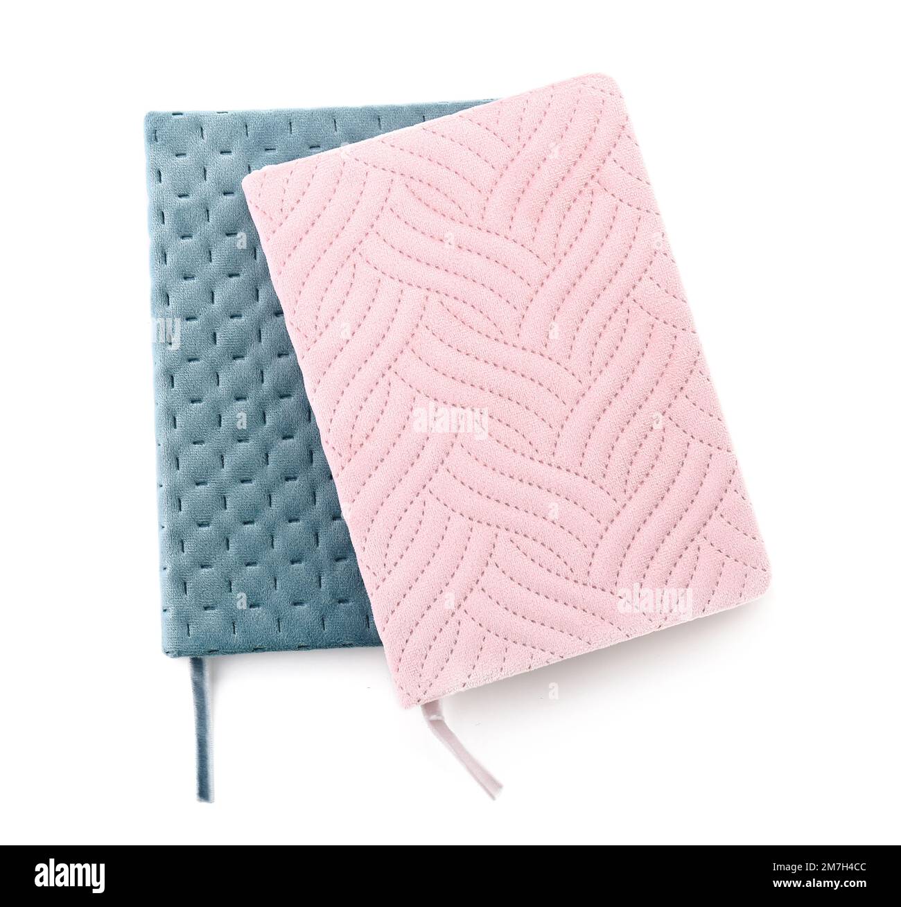 Two notebooks isolated on white background Stock Photo - Alamy