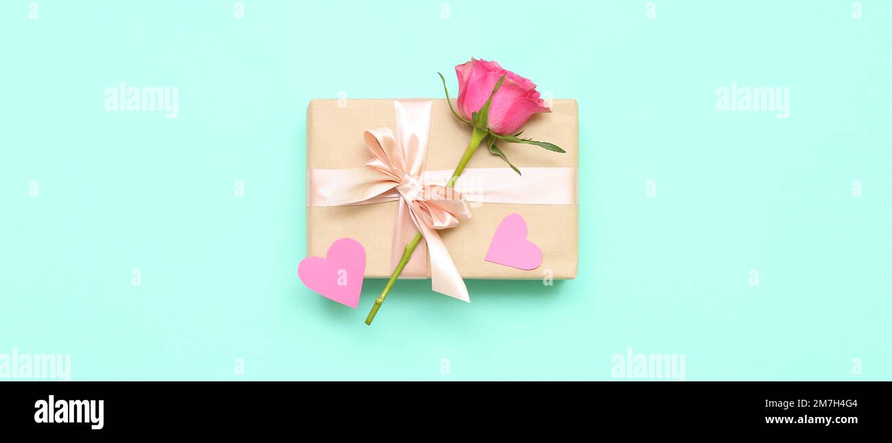 Beautiful gift with rose flower for Valentine's Day celebration on ...