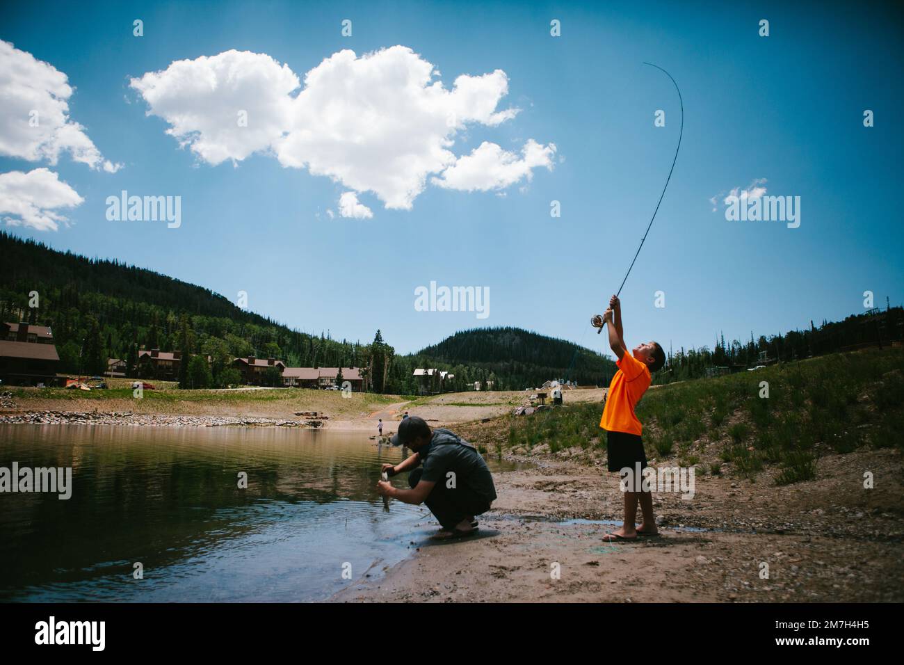 Fishing dad and son fish hi-res stock photography and images - Alamy