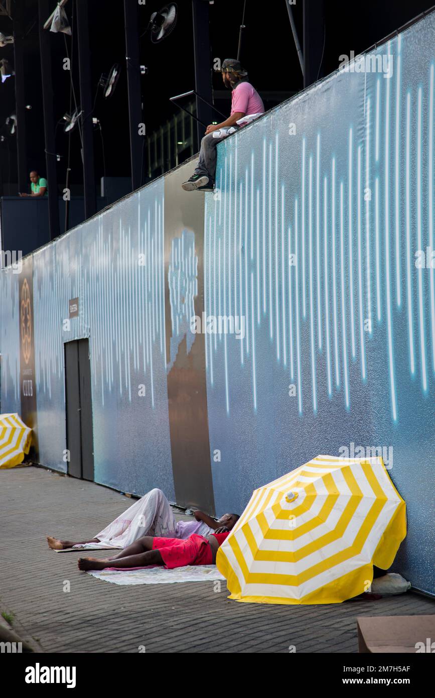 Two homeless people sleep in hi-res stock photography and images - Alamy