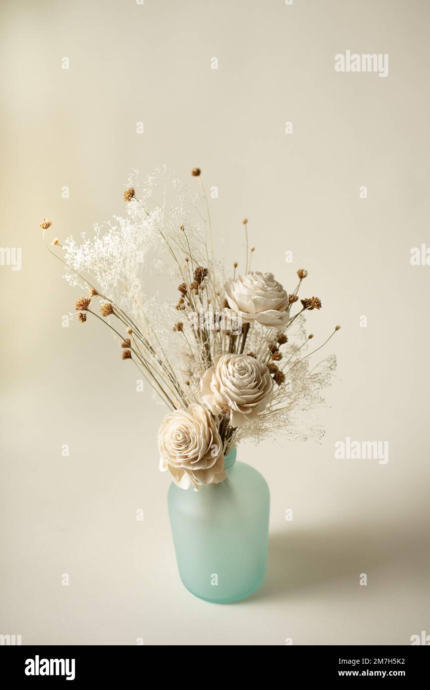 Simple Dry Floral Bouquet Design in a Blue Vase Stock Photo - Alamy